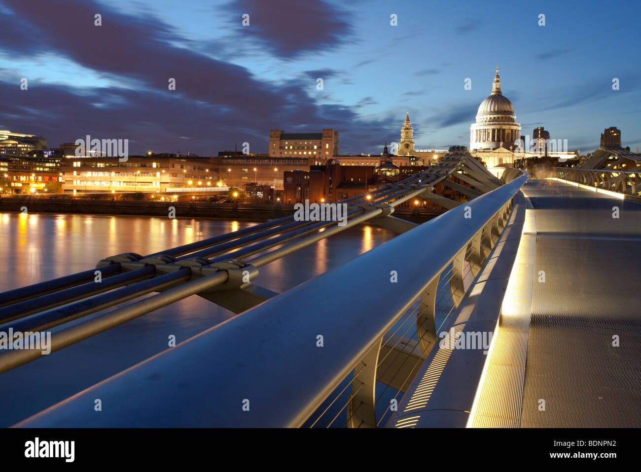 Millennium Bridge and St Paul's cathedral shot at sunset Stock Photo ...