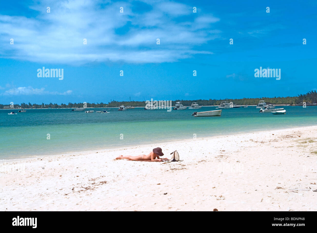Mauritius island beach sunbathing hi-res stock photography and images ...