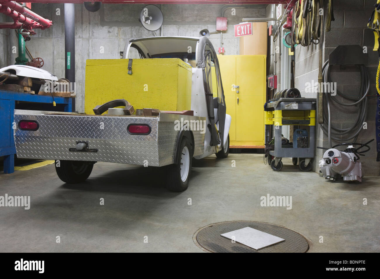 Electric vehicle in a maintenance room Stock Photo - Alamy