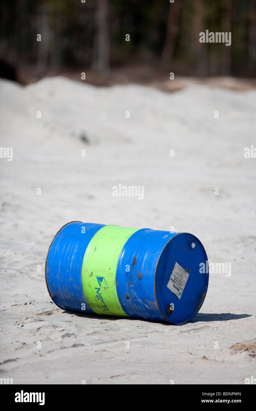 Lubricant oil barrel on sand Stock Photo - Alamy