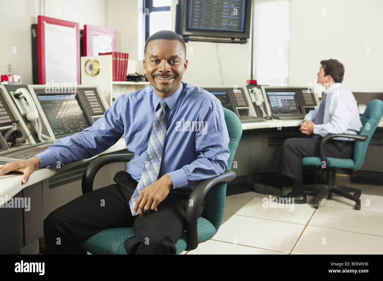 Two operating engineers in a control room Stock Photo - Alamy