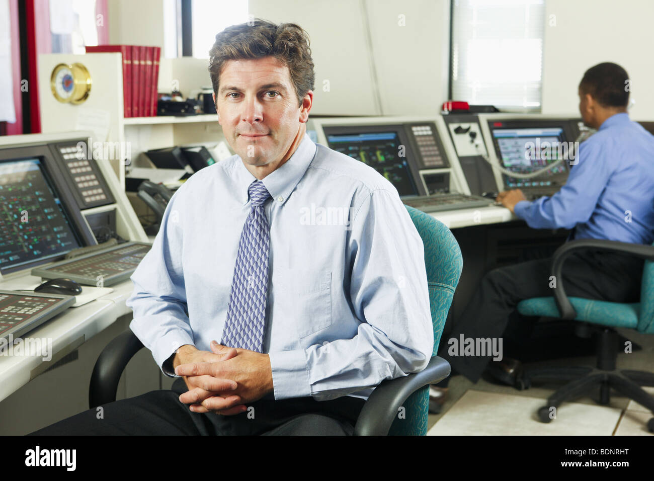 Two operating engineers in a control room Stock Photo - Alamy