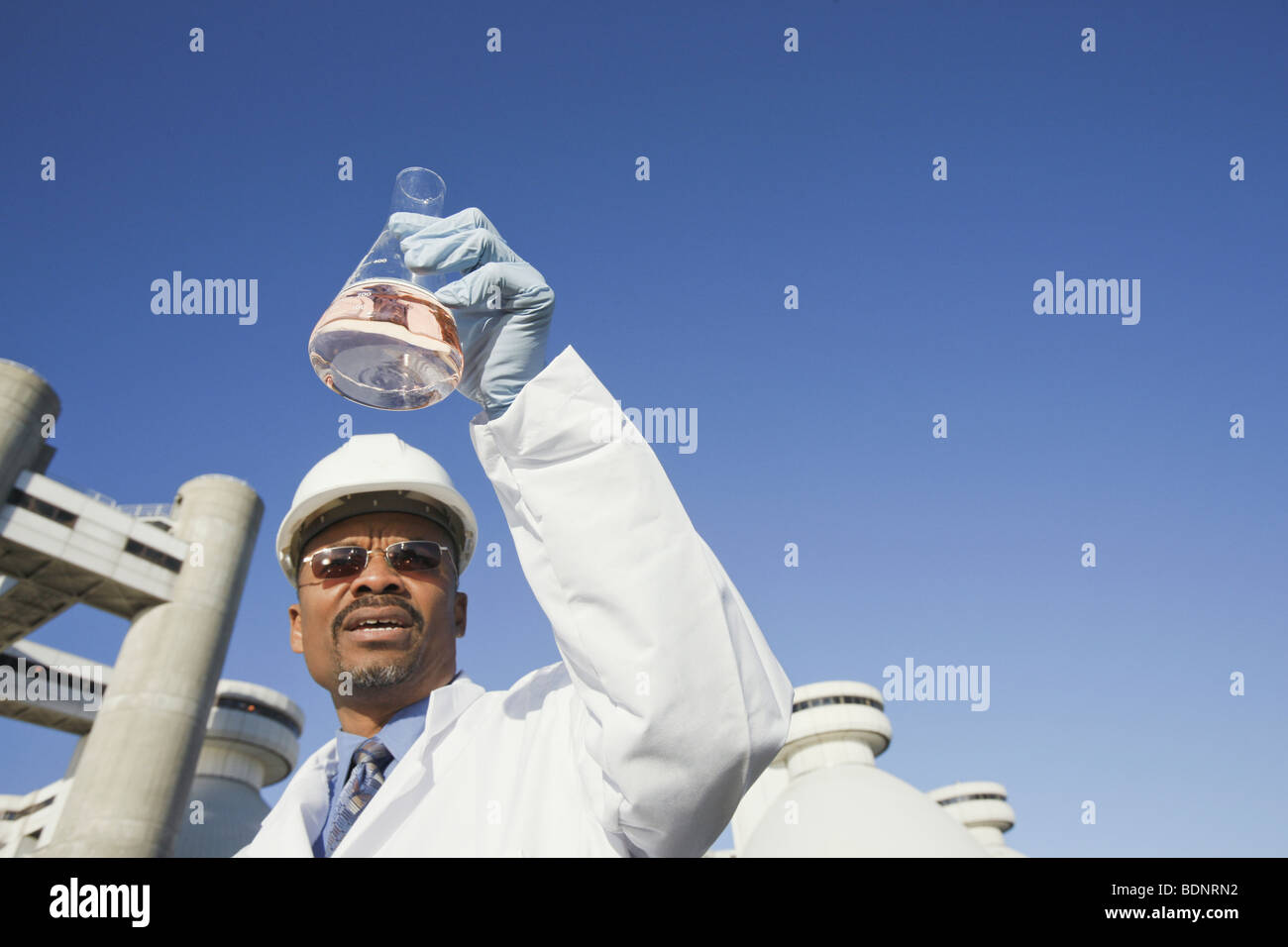 Scientist experimenting with a water sample Stock Photo - Alamy