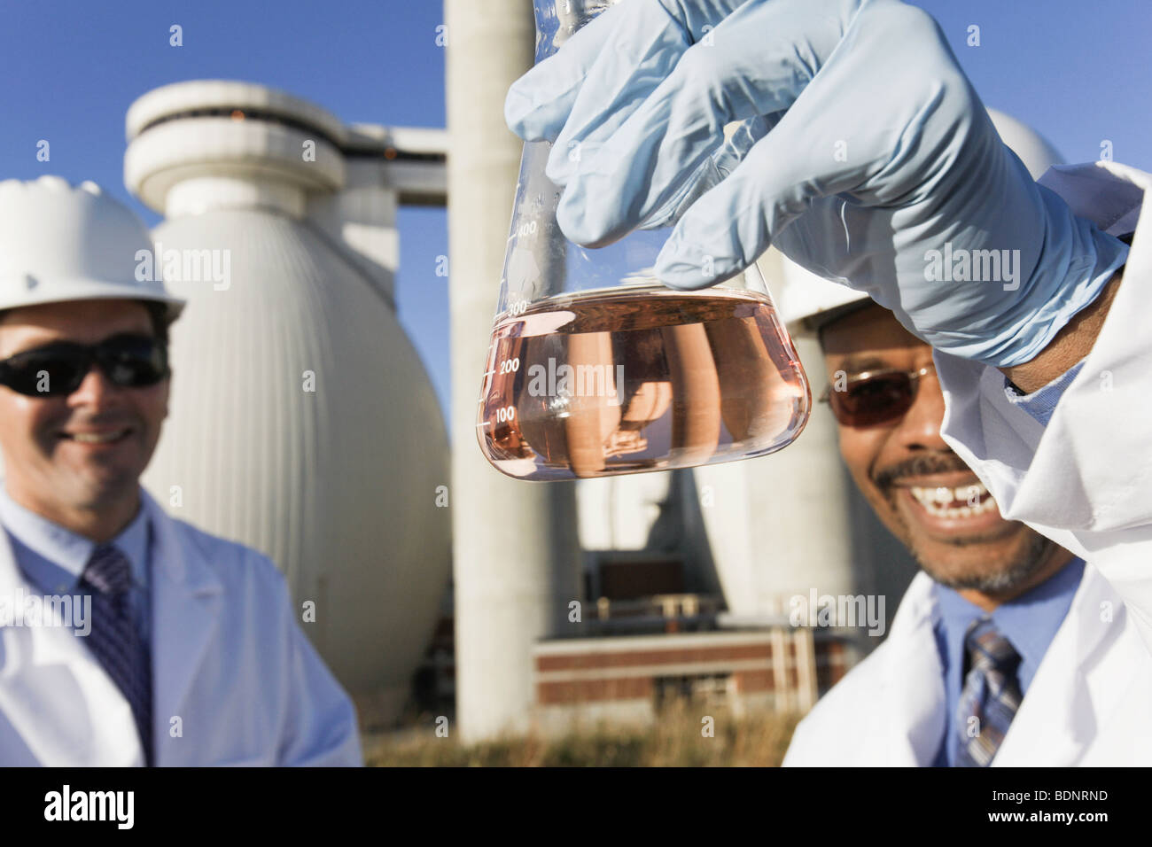 Two scientists experimenting with a water sample Stock Photo - Alamy