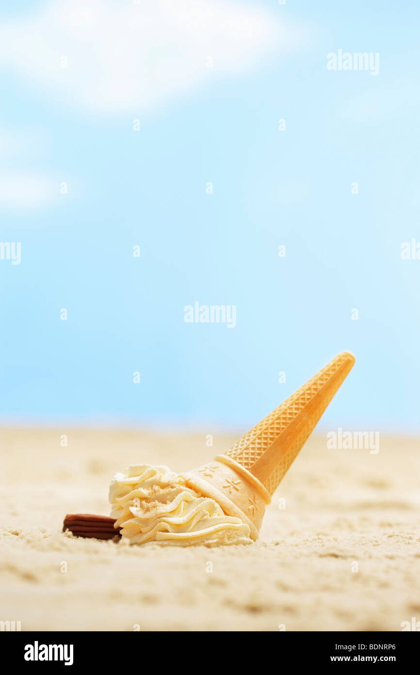 Fallen icecream in sand Stock Photo - Alamy