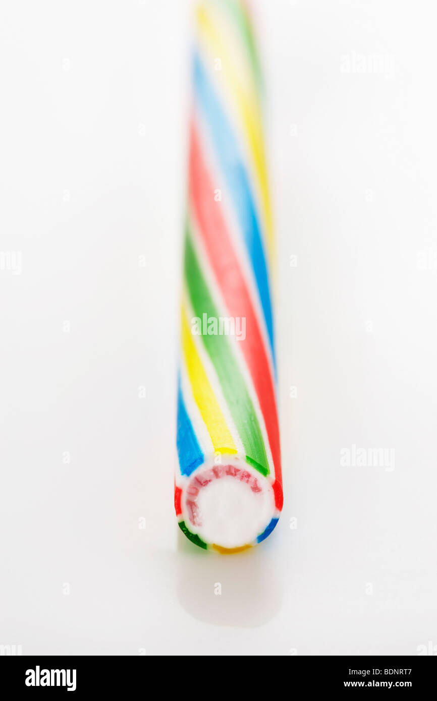 Single stick of rock candy, elevated view, studio shot Stock Photo - Alamy