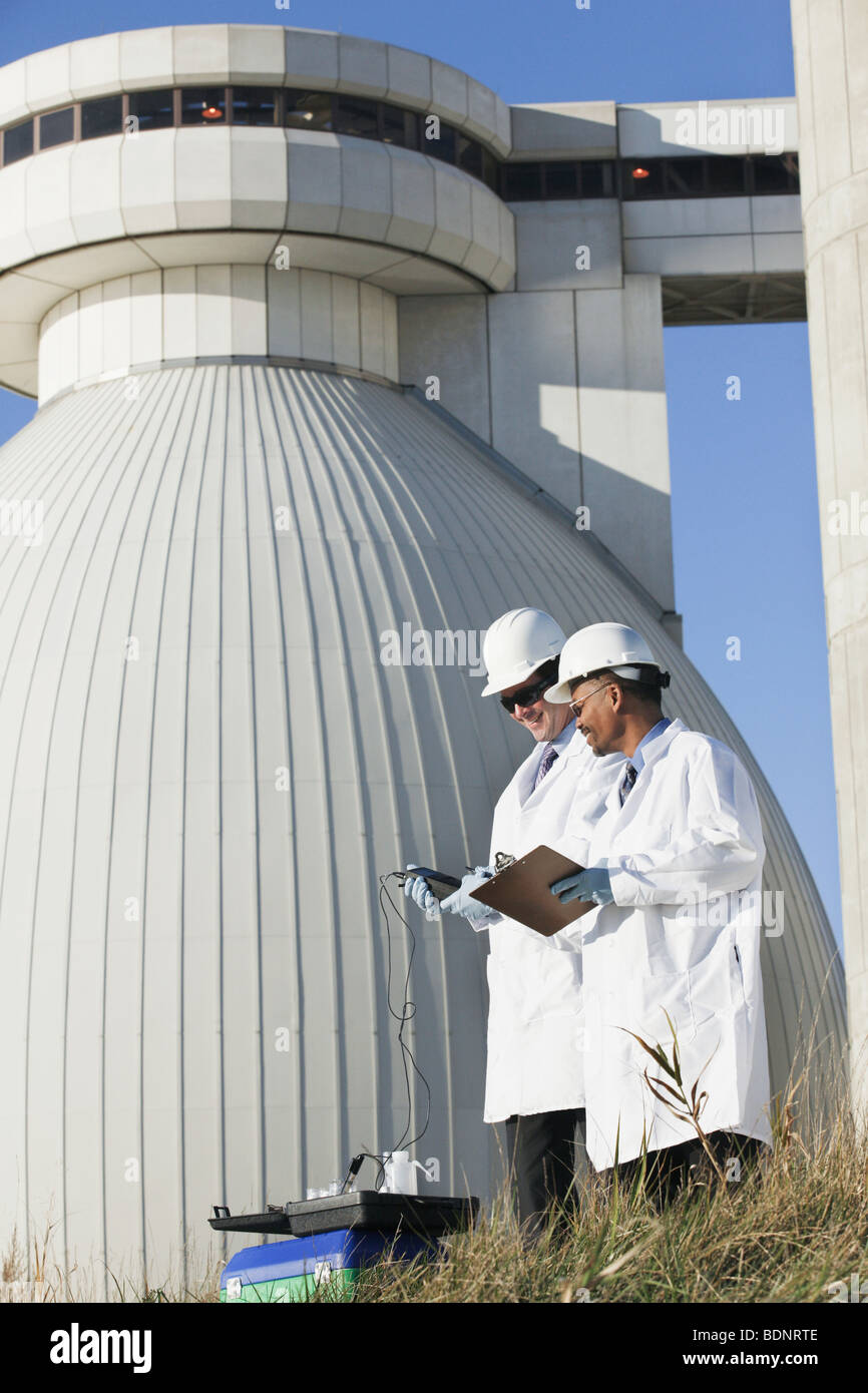 Two scientists experimenting with a water sample Stock Photo - Alamy