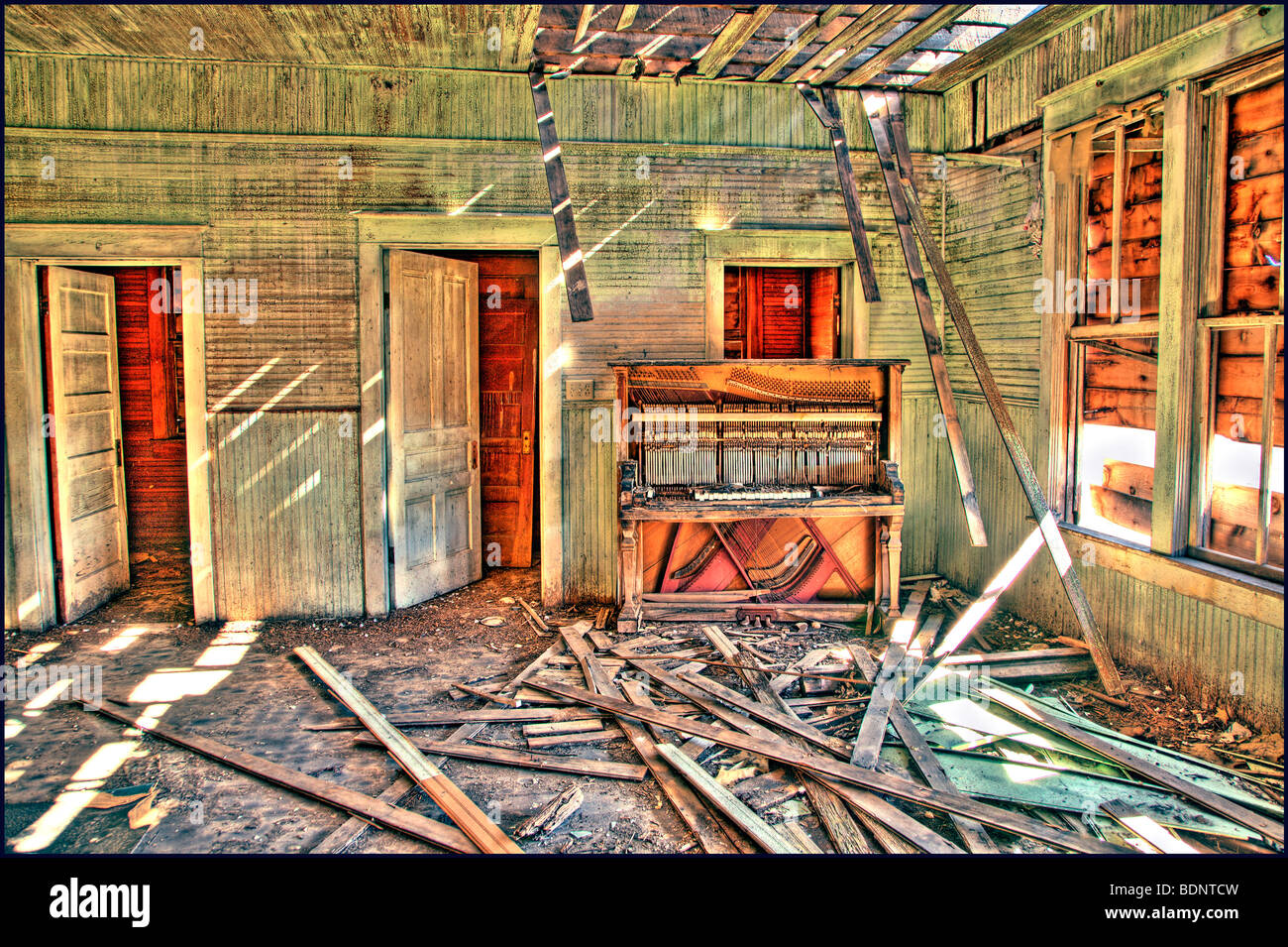 A wrecked interior with piano Stock Photo - Alamy