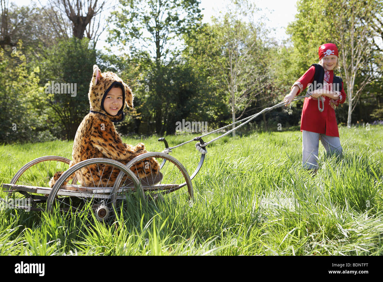 Child pulling cart hi-res stock photography and images - Alamy