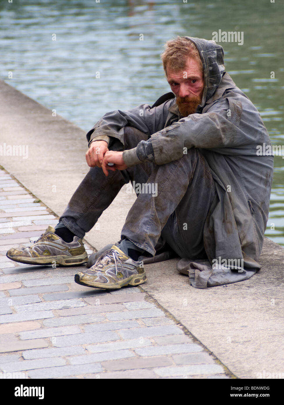 An actor playing a homeless person Stock Photo - Alamy