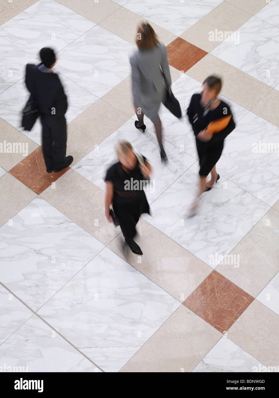 Business people walking, elevated view, long exposure Stock Photo - Alamy
