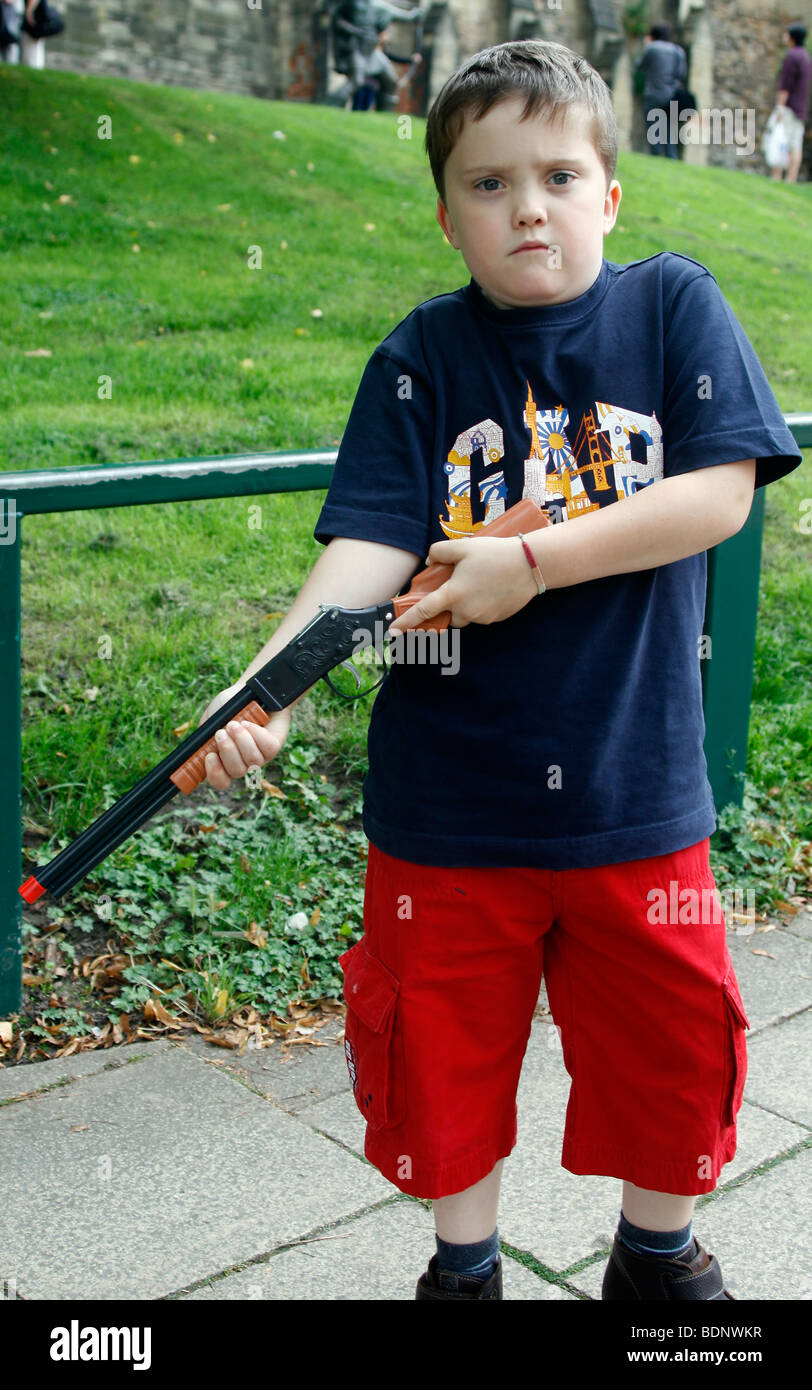 Boy with rifle hi-res stock photography and images - Alamy