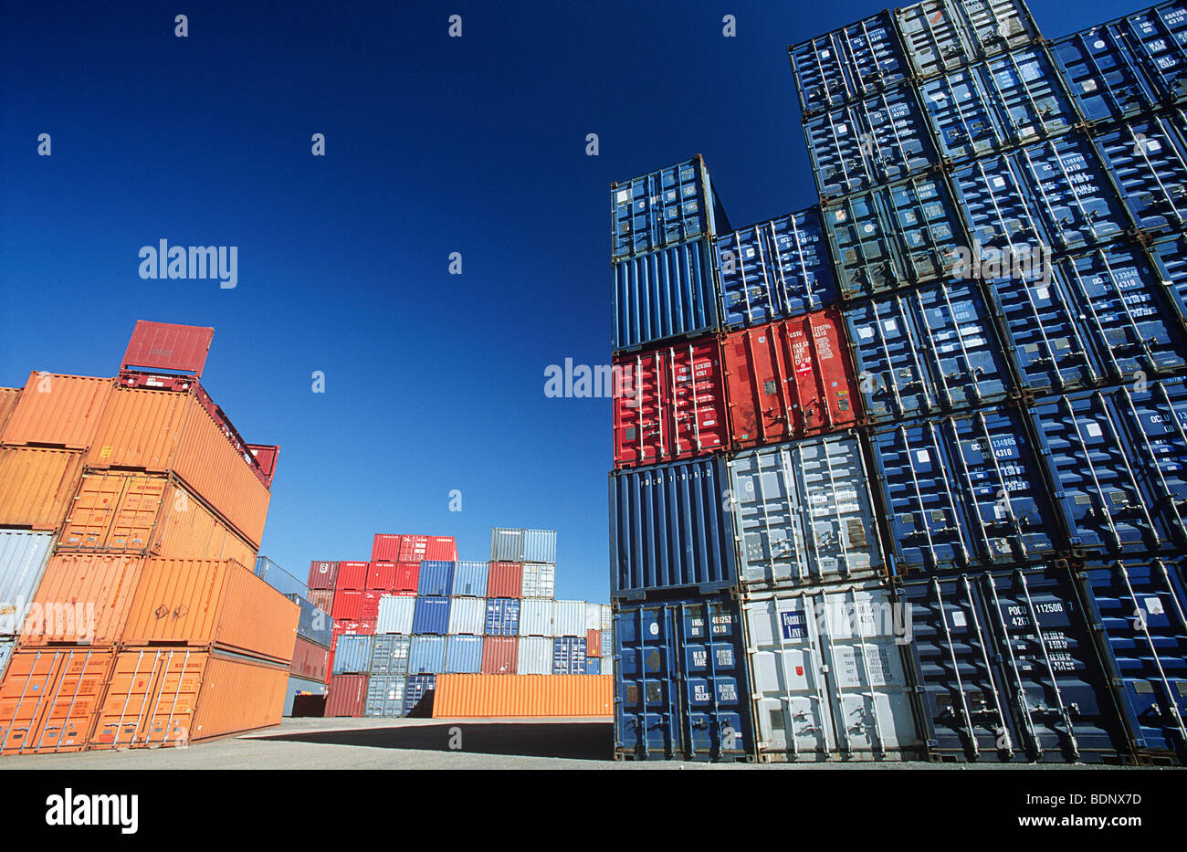 Shipping containers in storage yard Stock Photo - Alamy