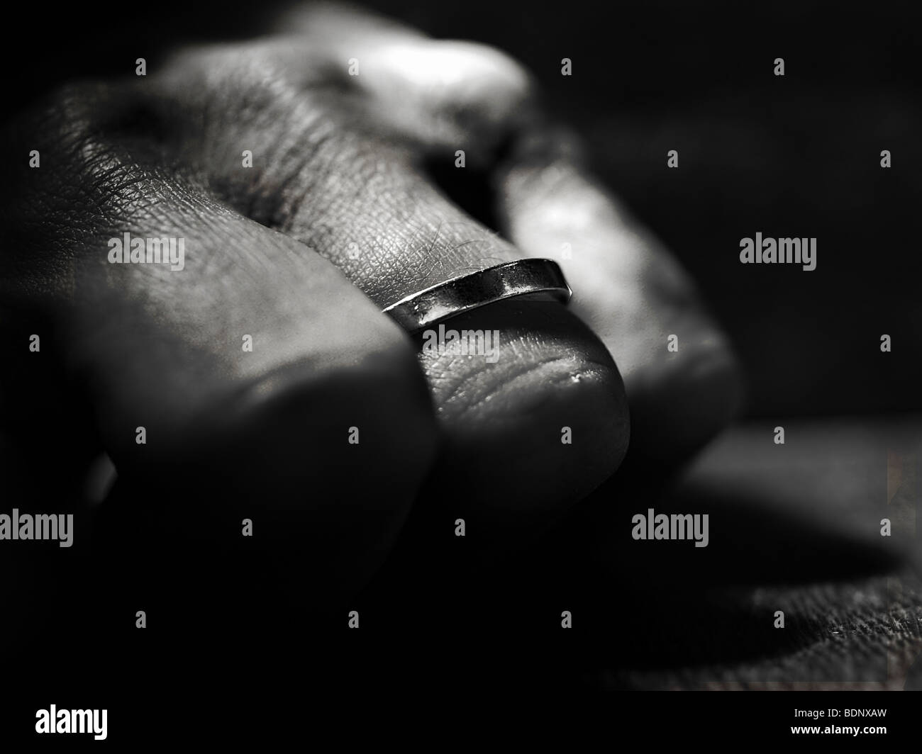 A hand wearing a ring Stock Photo - Alamy