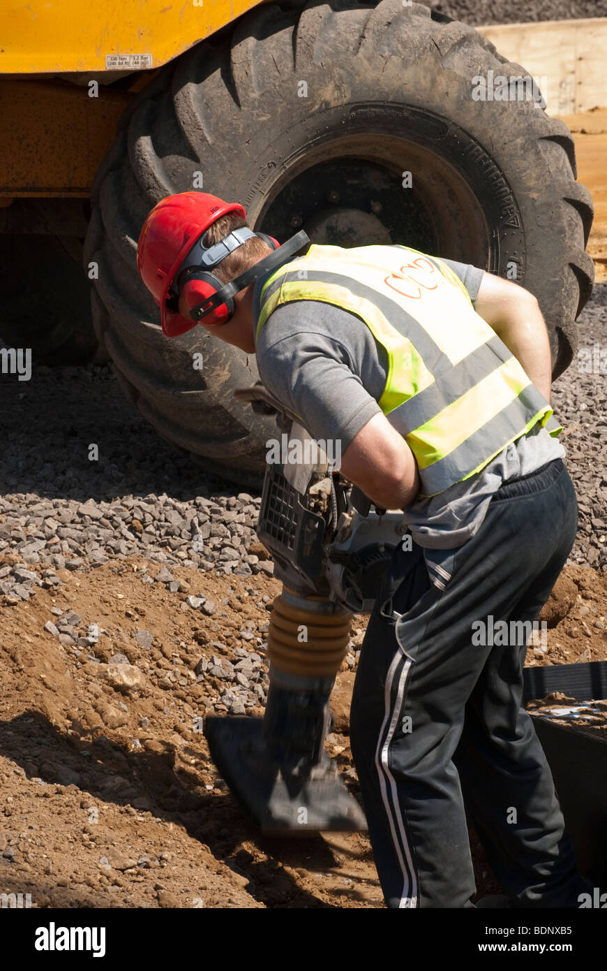 construction workers on building site Stock Photo - Alamy