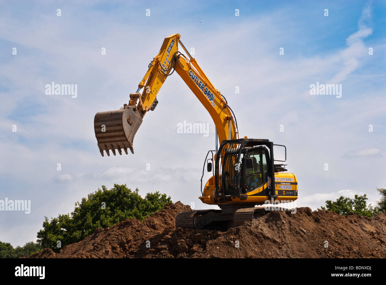 Digger development building site hi-res stock photography and images ...
