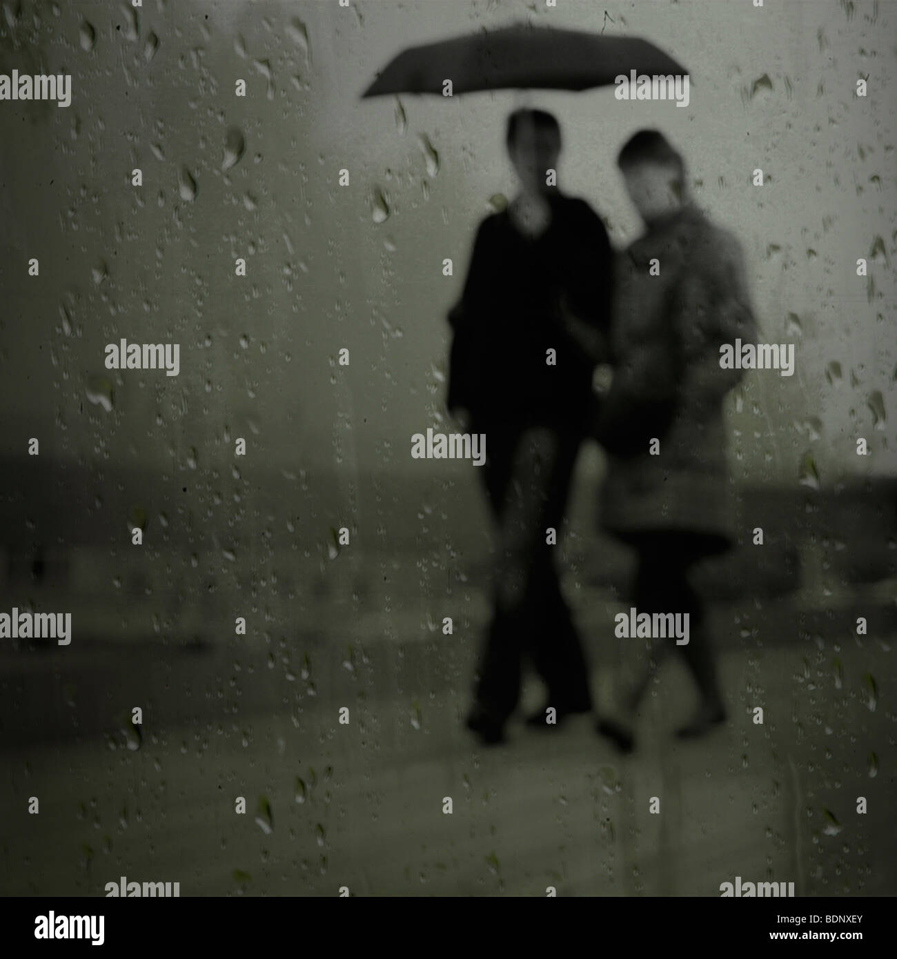 People Walking In The Rain High Resolution Stock Photography and Images ...