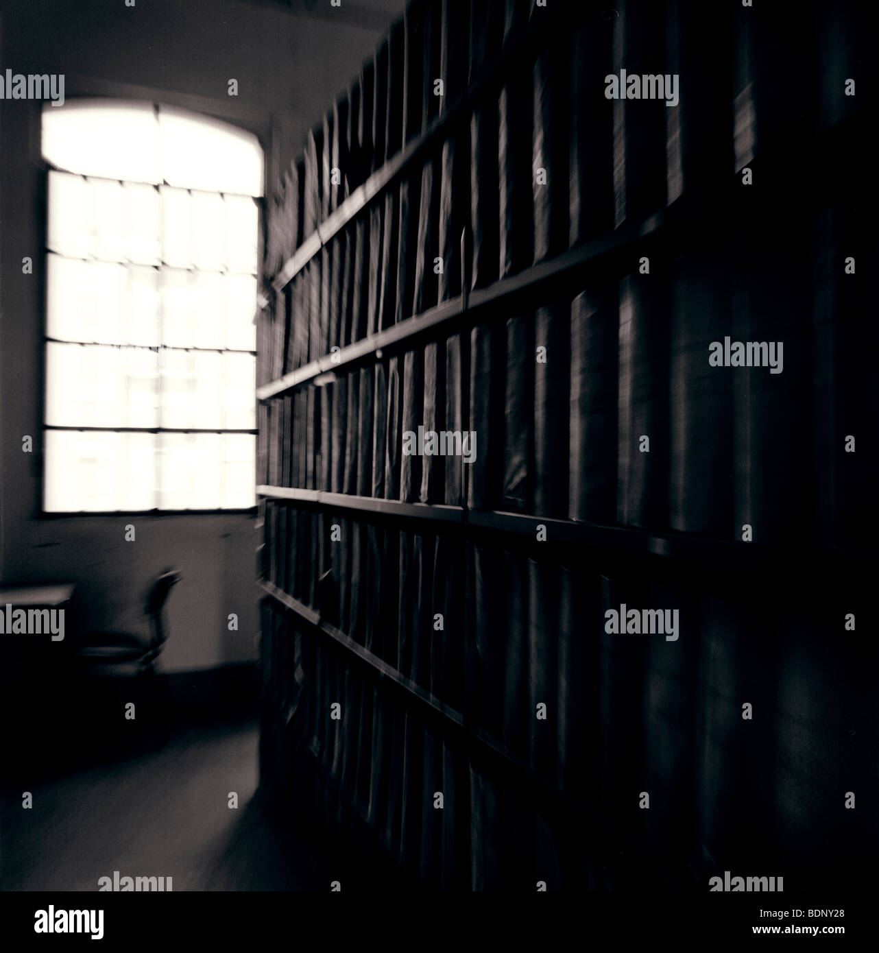 Sunlight shining in through a library window Stock Photo - Alamy