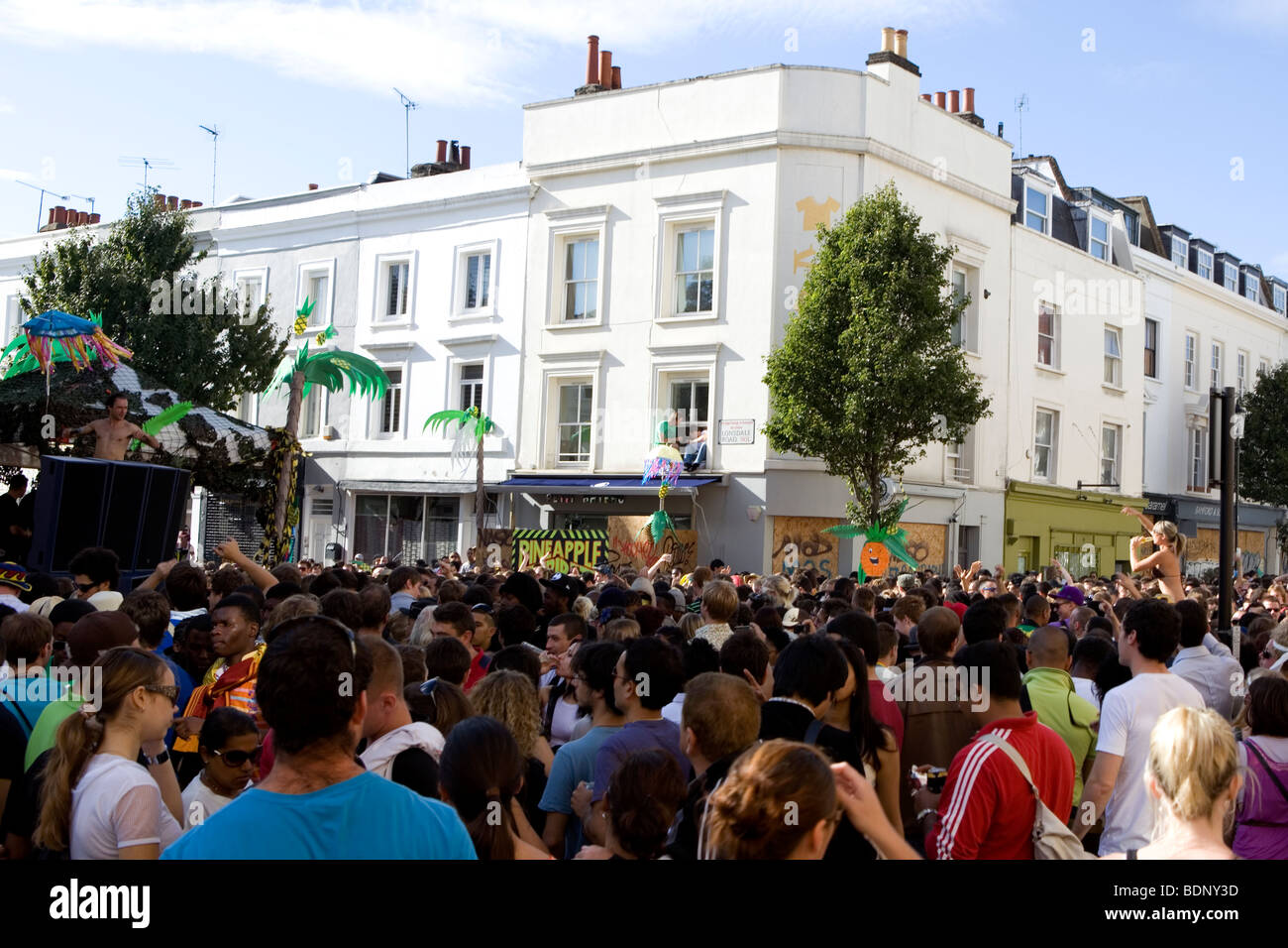 Crowd dancing at the Notting Hill carnival Pineapple tribe sound stage Stock Photo - Alamy