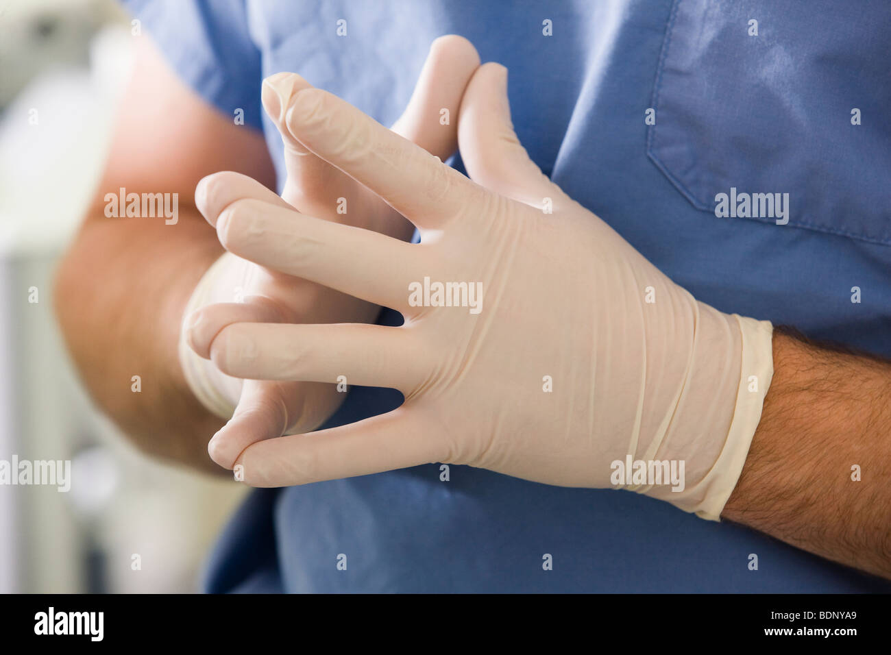 Close-up of surgeon's hands with gloves Stock Photo - Alamy