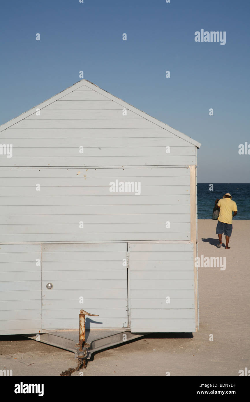 USA, Florida, Miami, South Beach, man walking on beach Stock Photo - Alamy