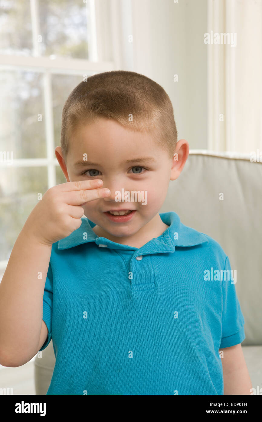 Boy signing the letter 'H' in American Sign Language Stock Photo - Alamy