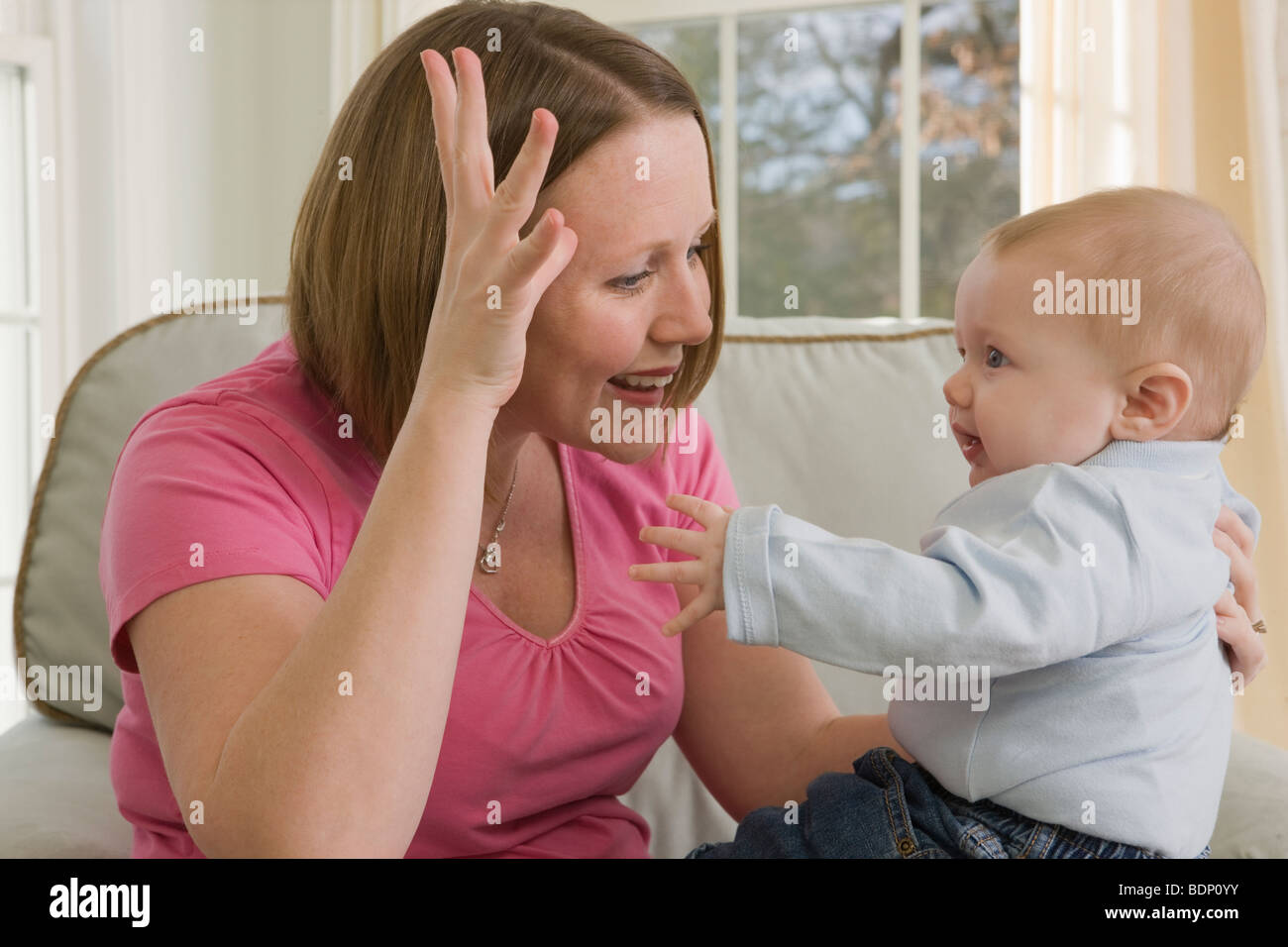 Baby sign language hi-res stock photography and images - Alamy