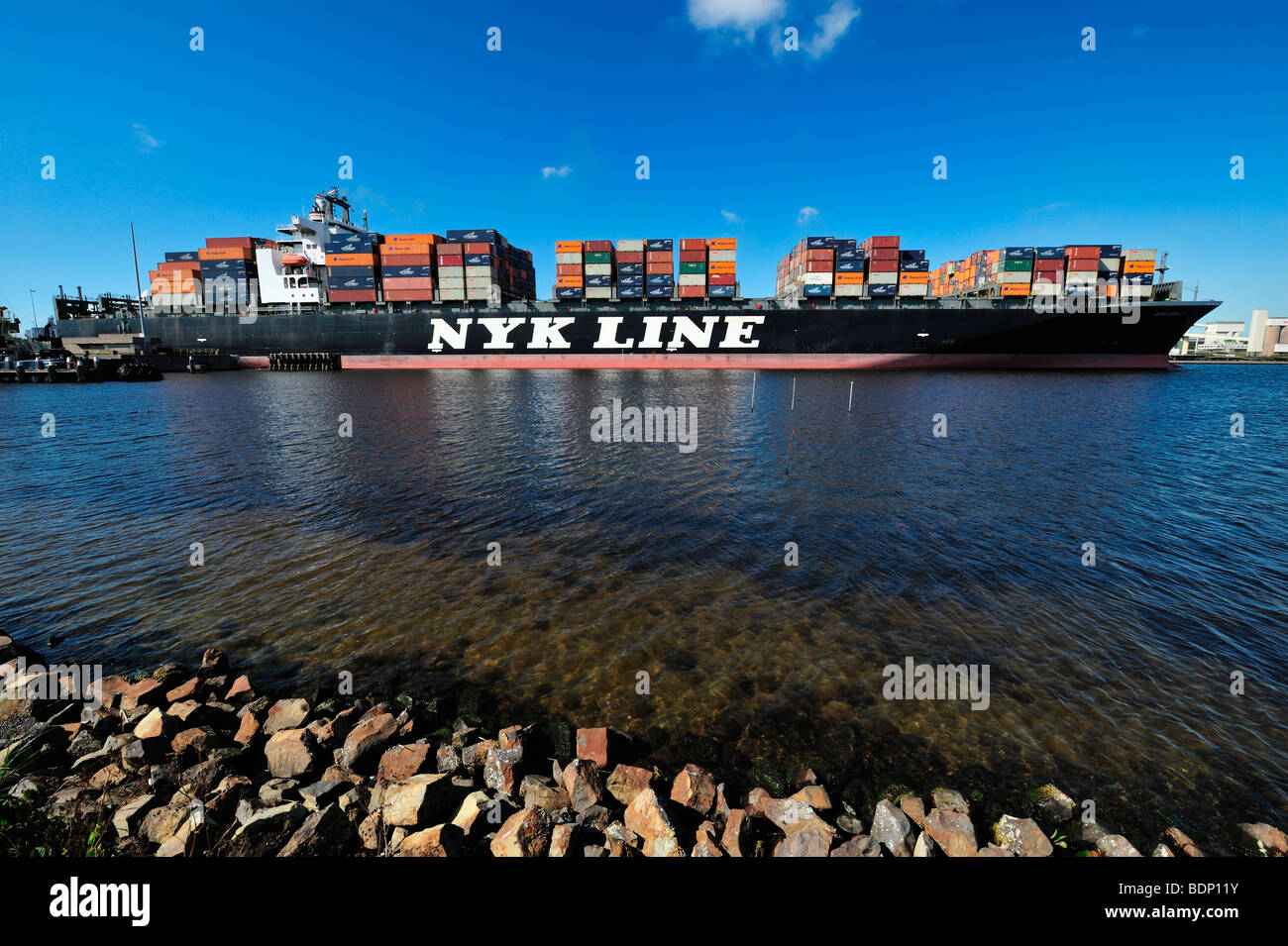 Huge container ship from NYK line in the harbor of IJmuiden, Holland ...