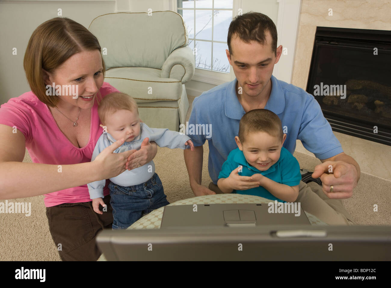 Woman signing the word 'Baby' in American Sign Language while sitting ...
