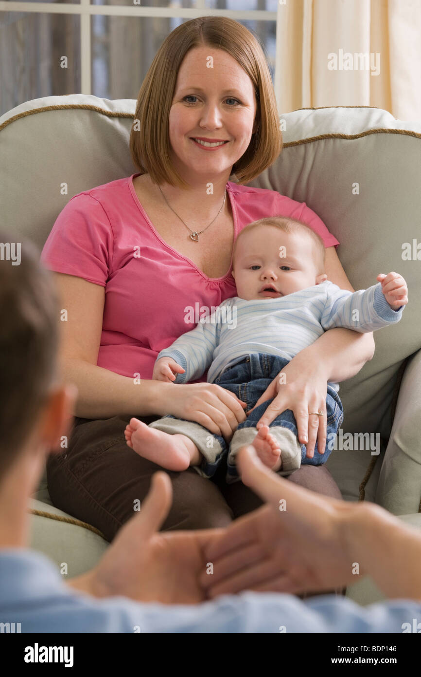 Man signing the word 'Baby' in American Sign Language while ...