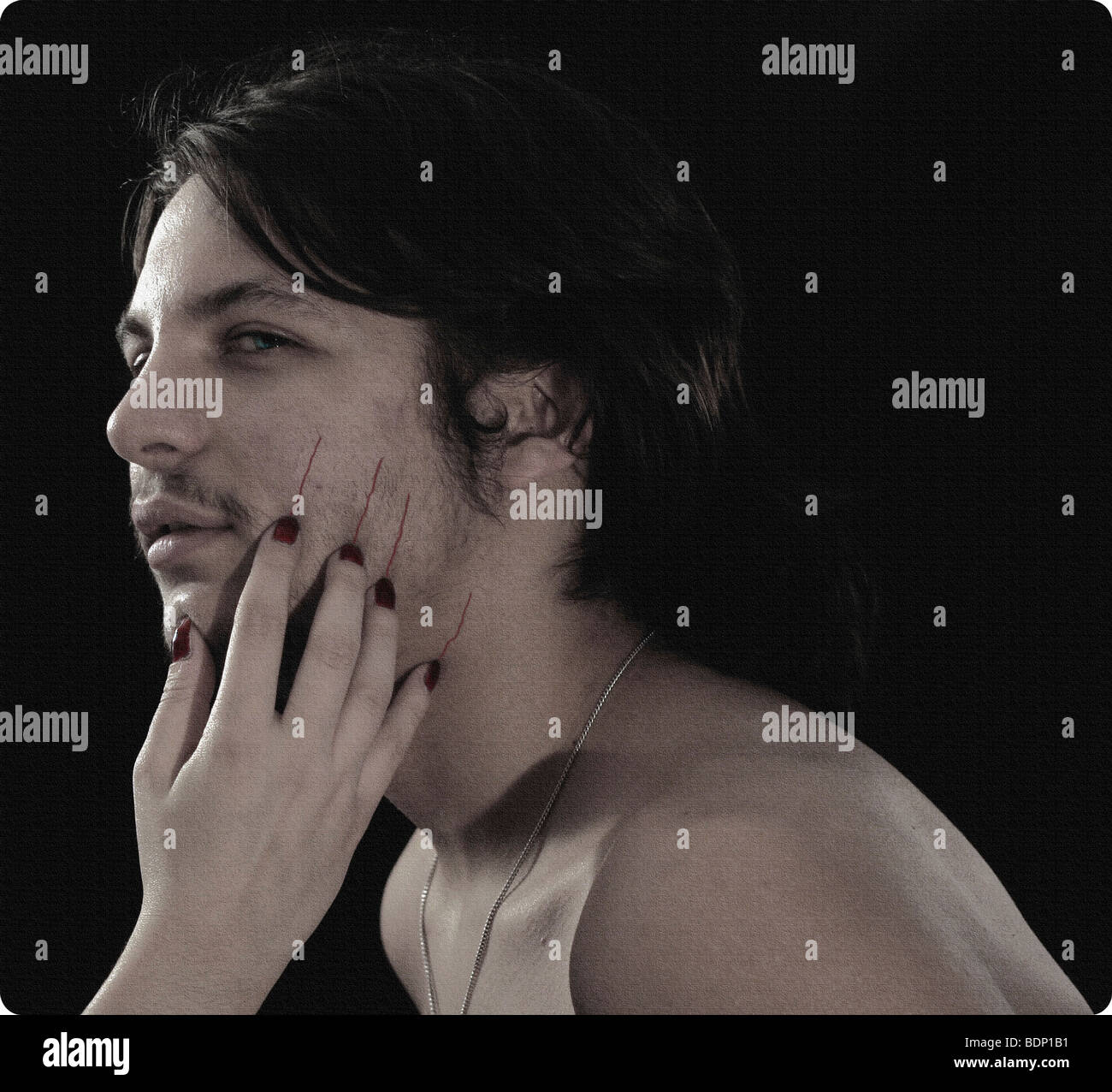 A female hand scratching the face of a young man Stock Photo - Alamy