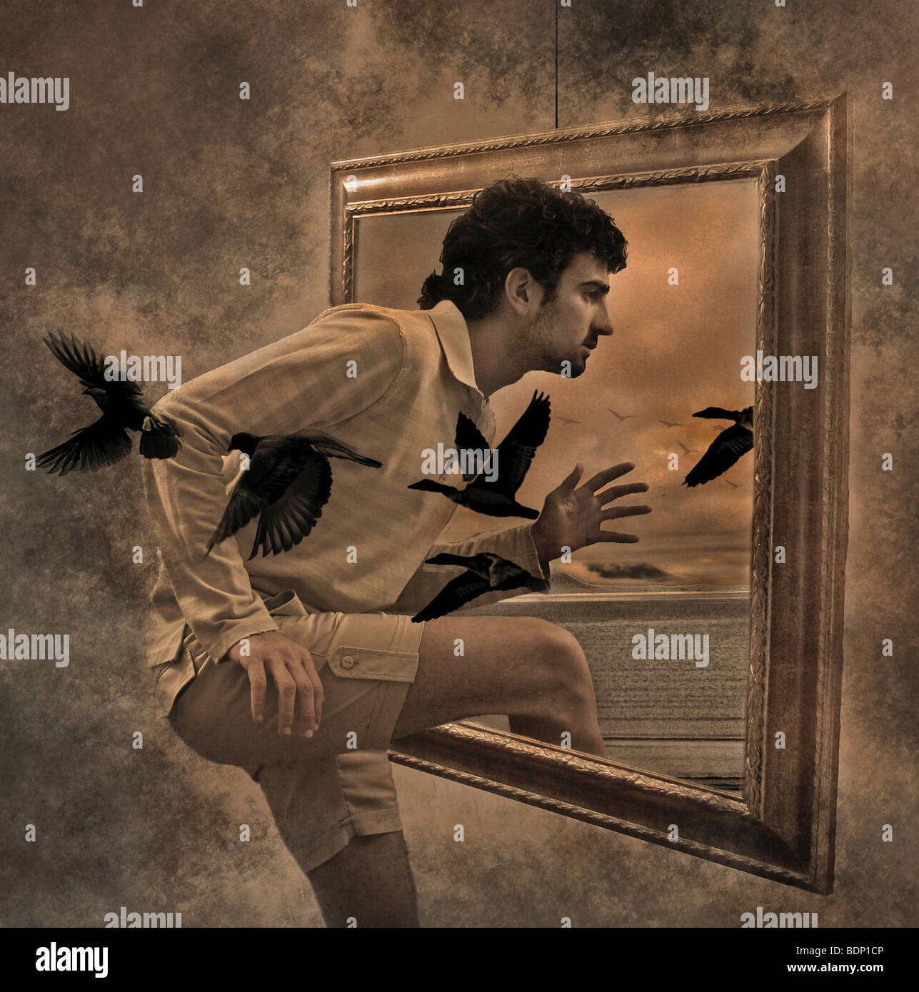 A young man escaping through a picture frame with black birds flying ...