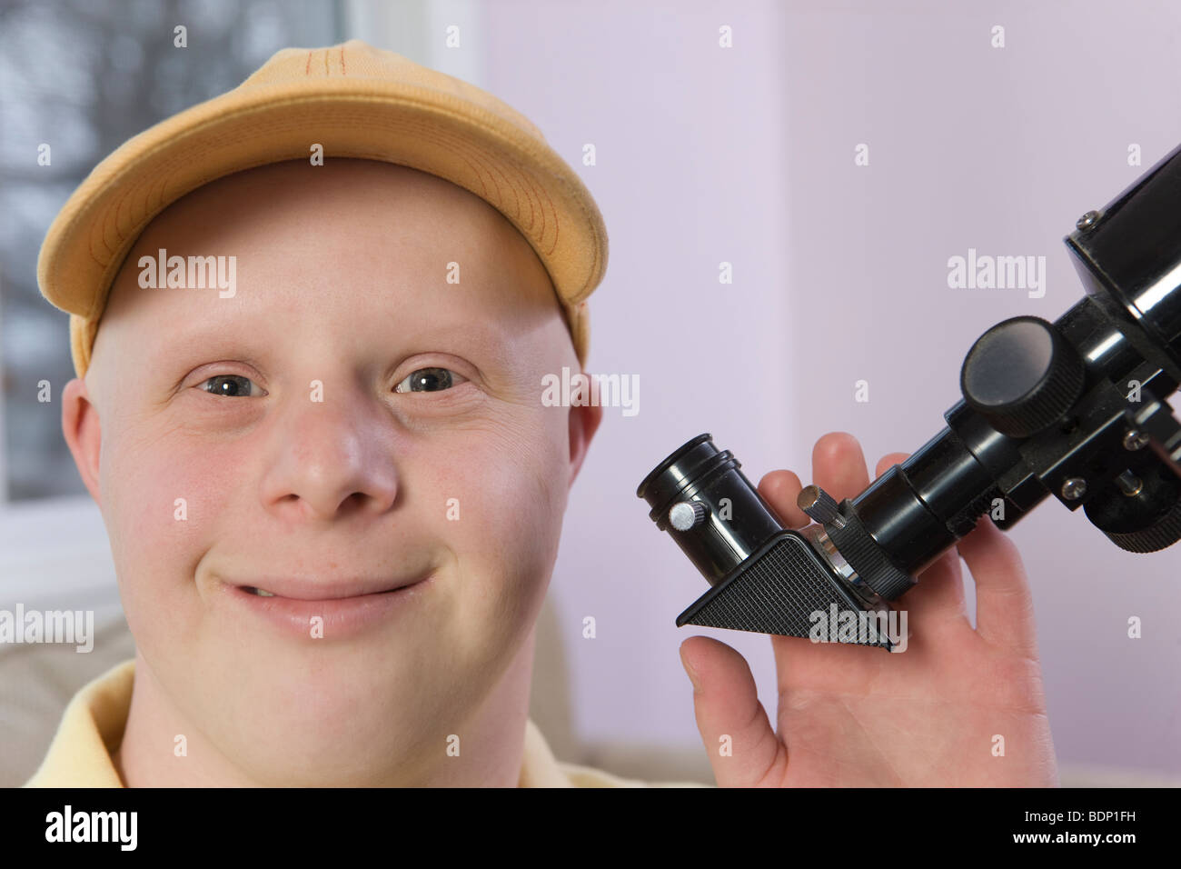 Man with a telescope Stock Photo - Alamy