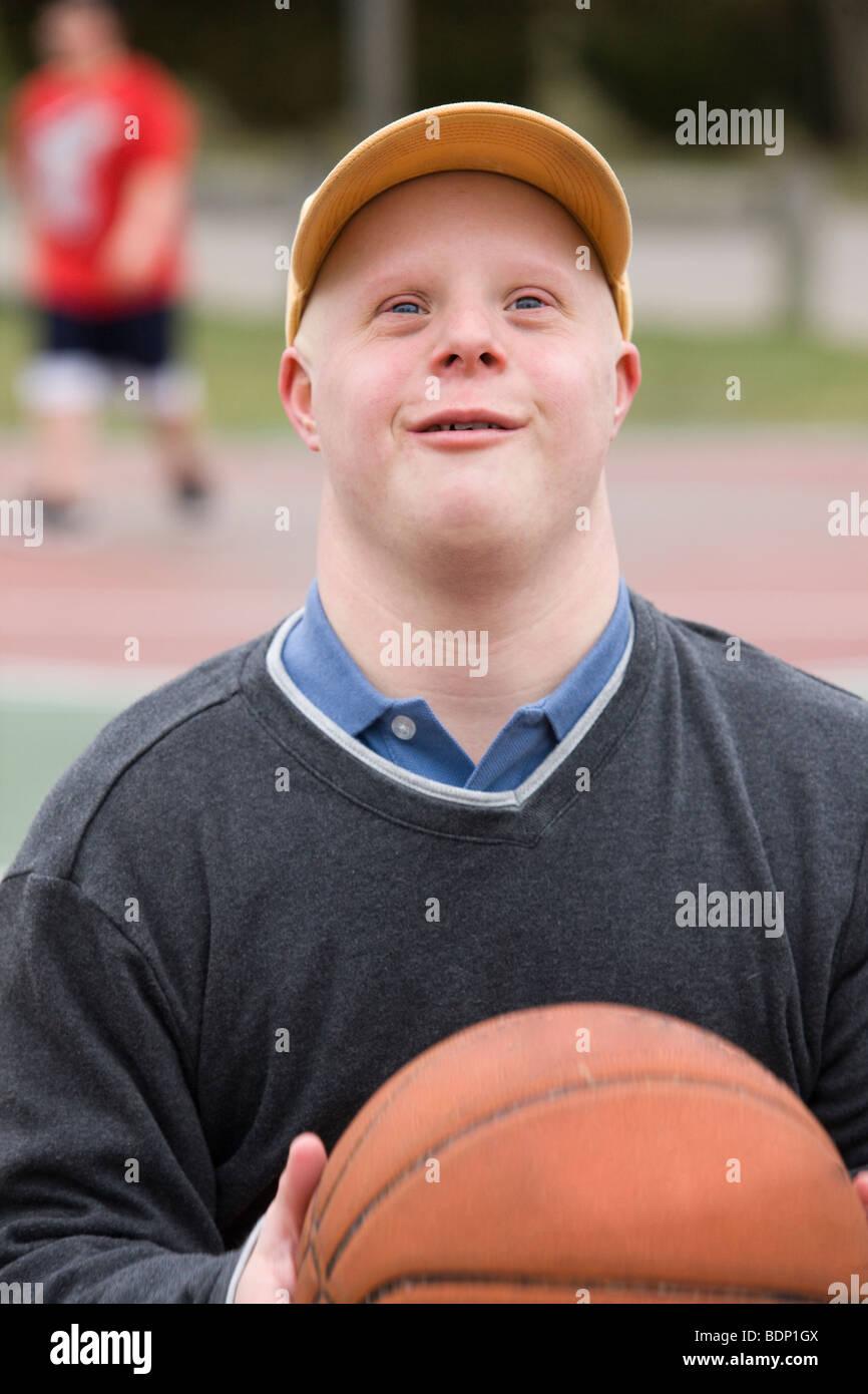 Man playing basketball Stock Photo - Alamy