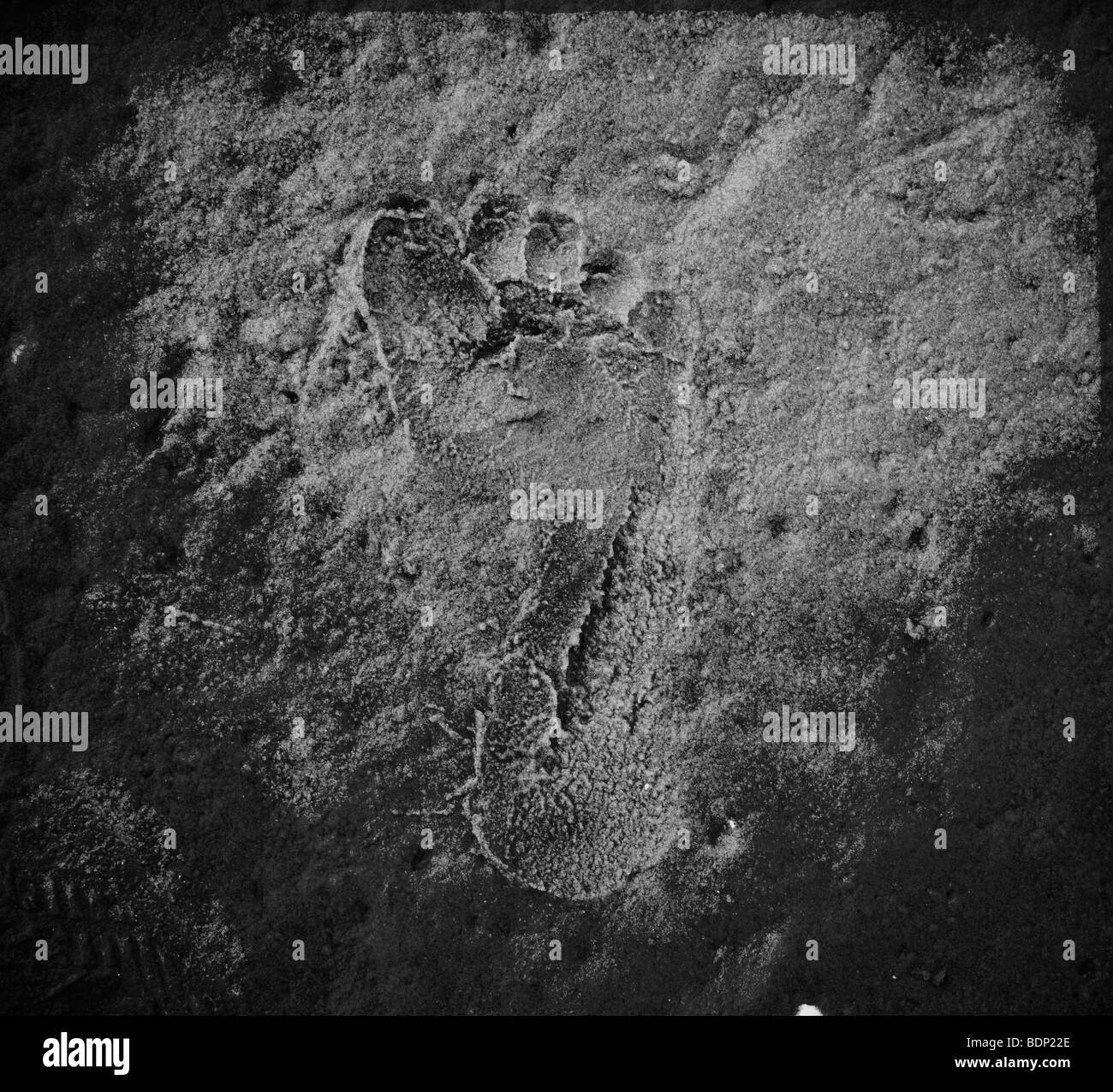 Child footprint in the sand Black and White Stock Photos & Images - Alamy