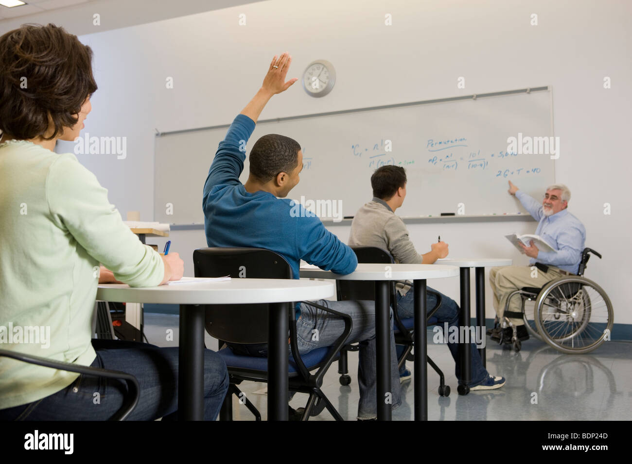 University professor teaching his students in a classroom Stock Photo ...