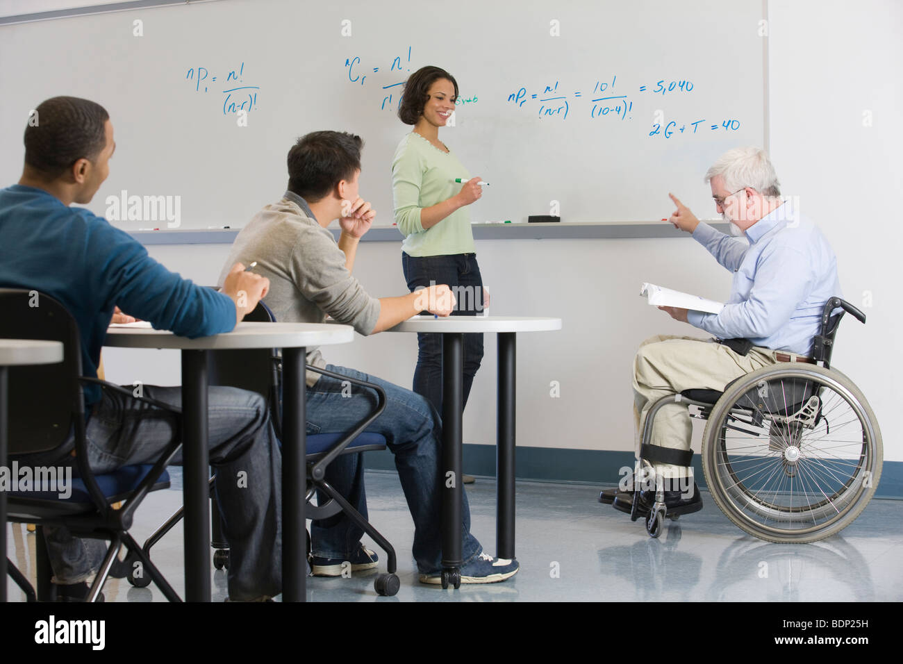University professor with his students in a classroom Stock Photo - Alamy