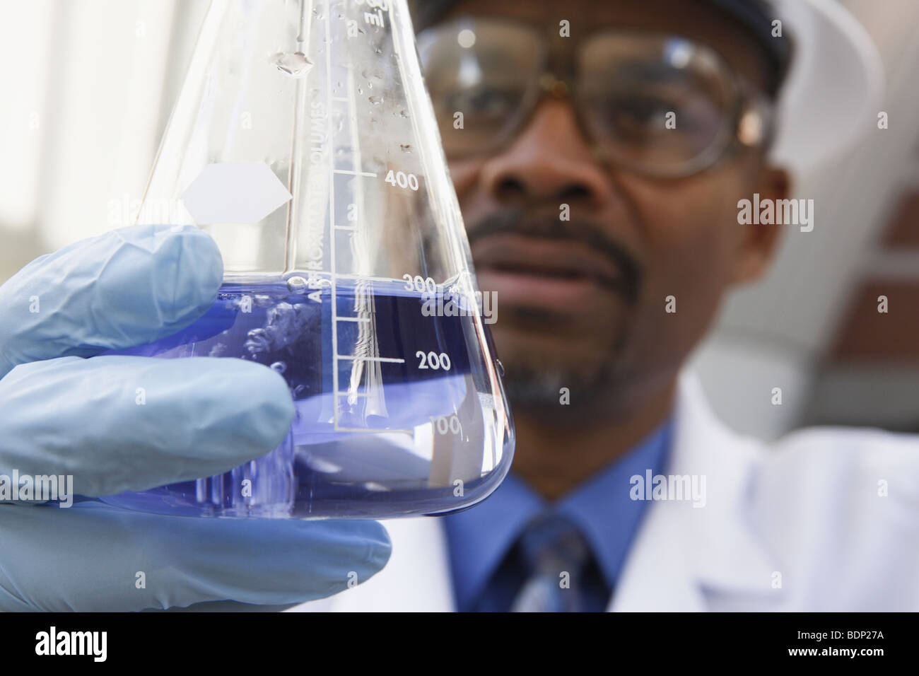 Scientist experimenting with a water sample Stock Photo - Alamy