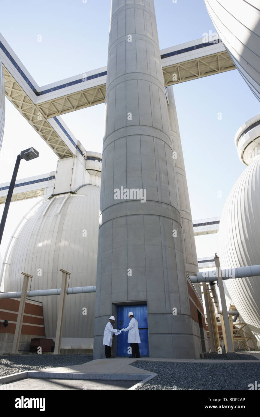 Two scientists standing in front of an elevator Stock Photo - Alamy Two scientists standing in front of an elevator Stock Photo - Alamy