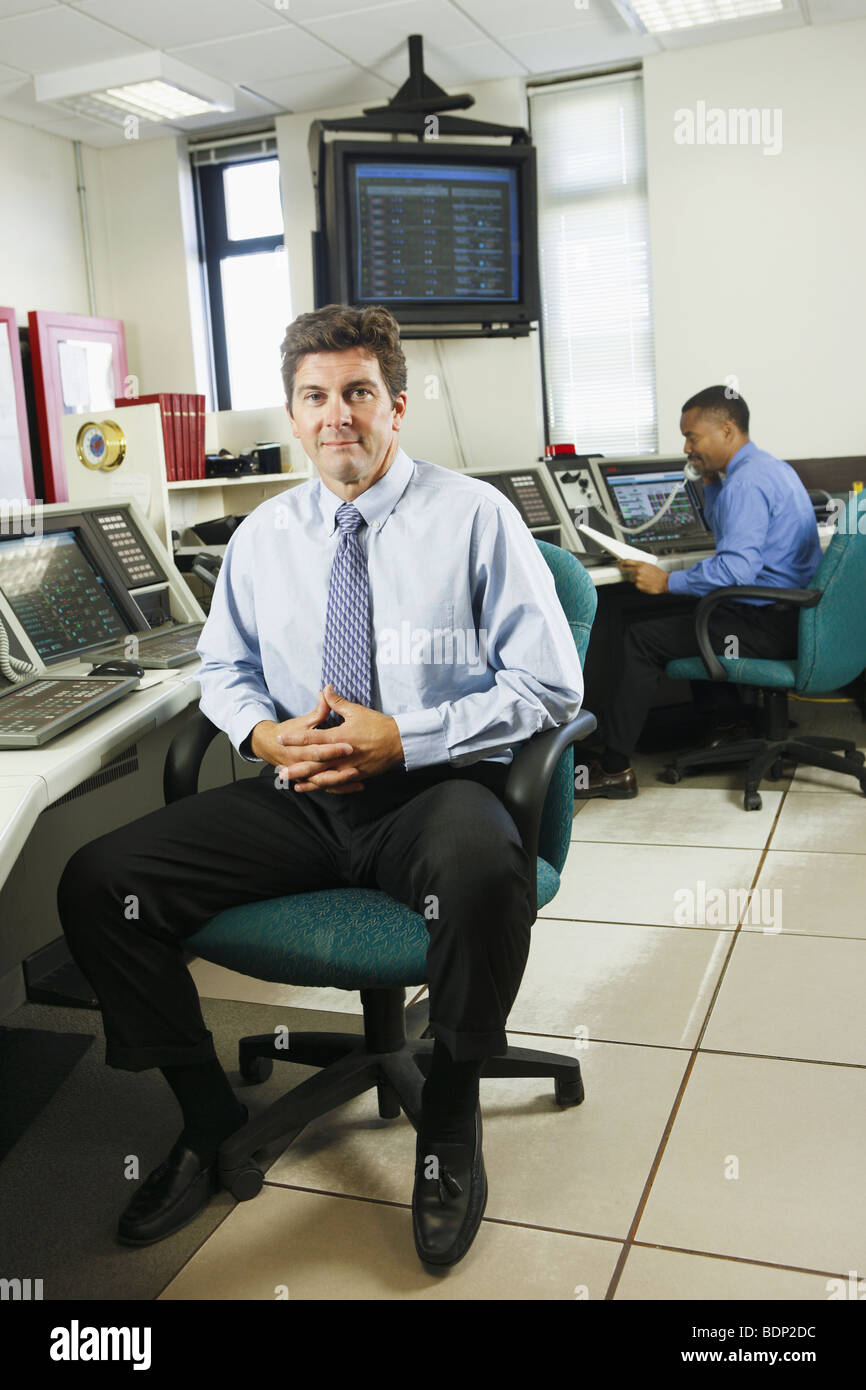 Two operating engineers in a control room Stock Photo - Alamy