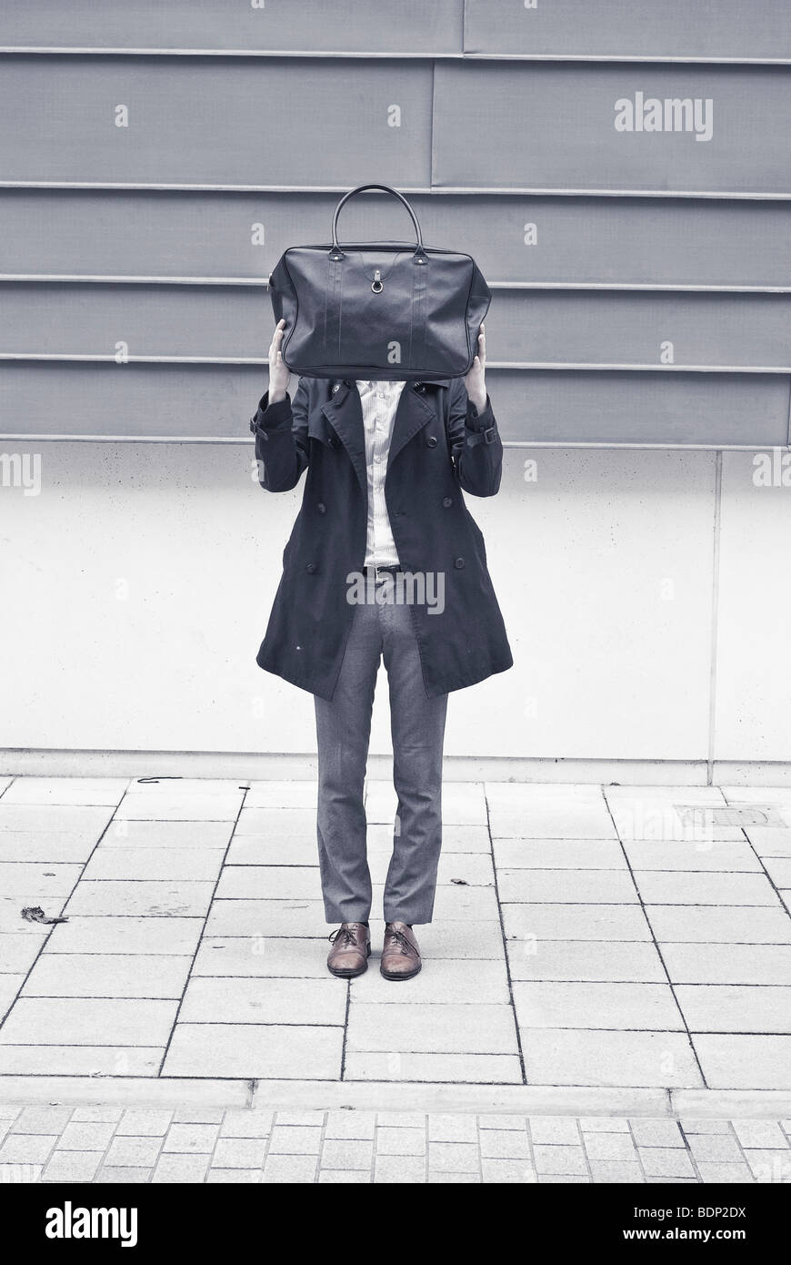 Hiding Behind Bag High Resolution Stock Photography and Images - Alamy