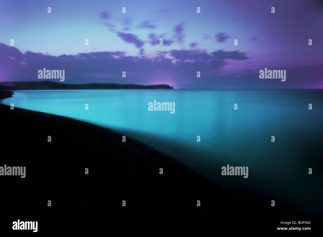 A blue sea with shore Stock Photo - Alamy