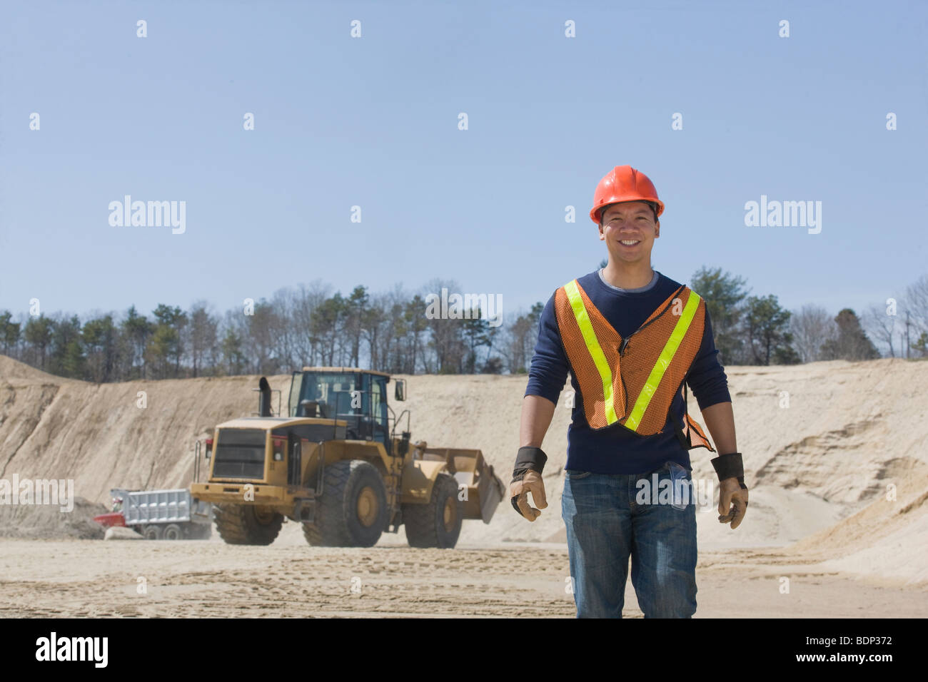 Engineer standing at a plant Stock Photo - Alamy