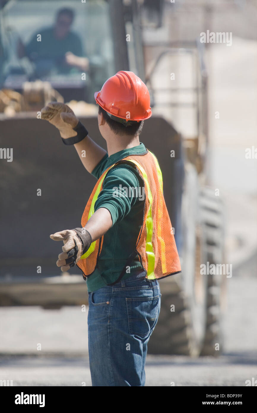 Engineer standing at a plant Stock Photo - Alamy