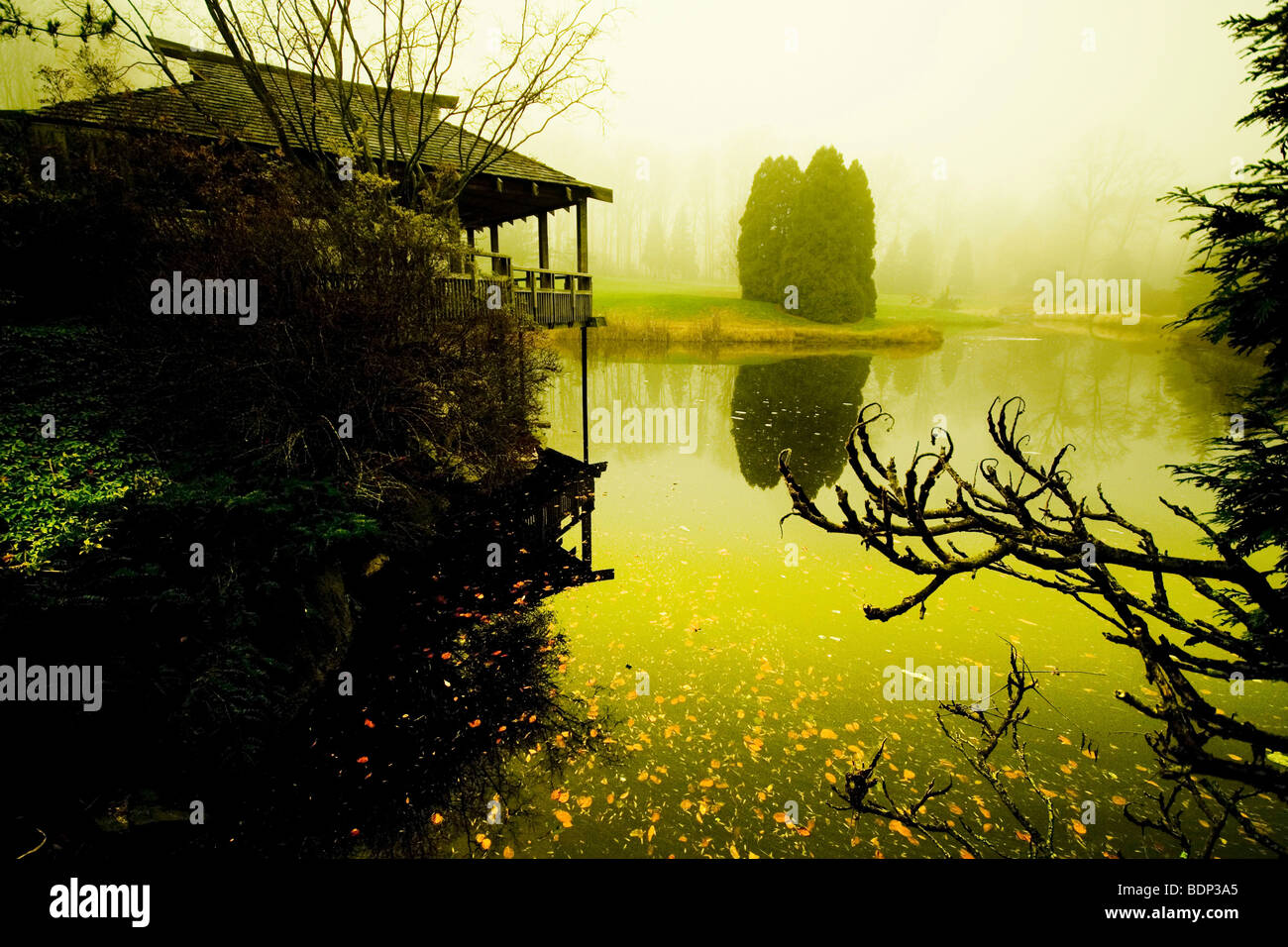 Calm water in lake with building Stock Photo - Alamy