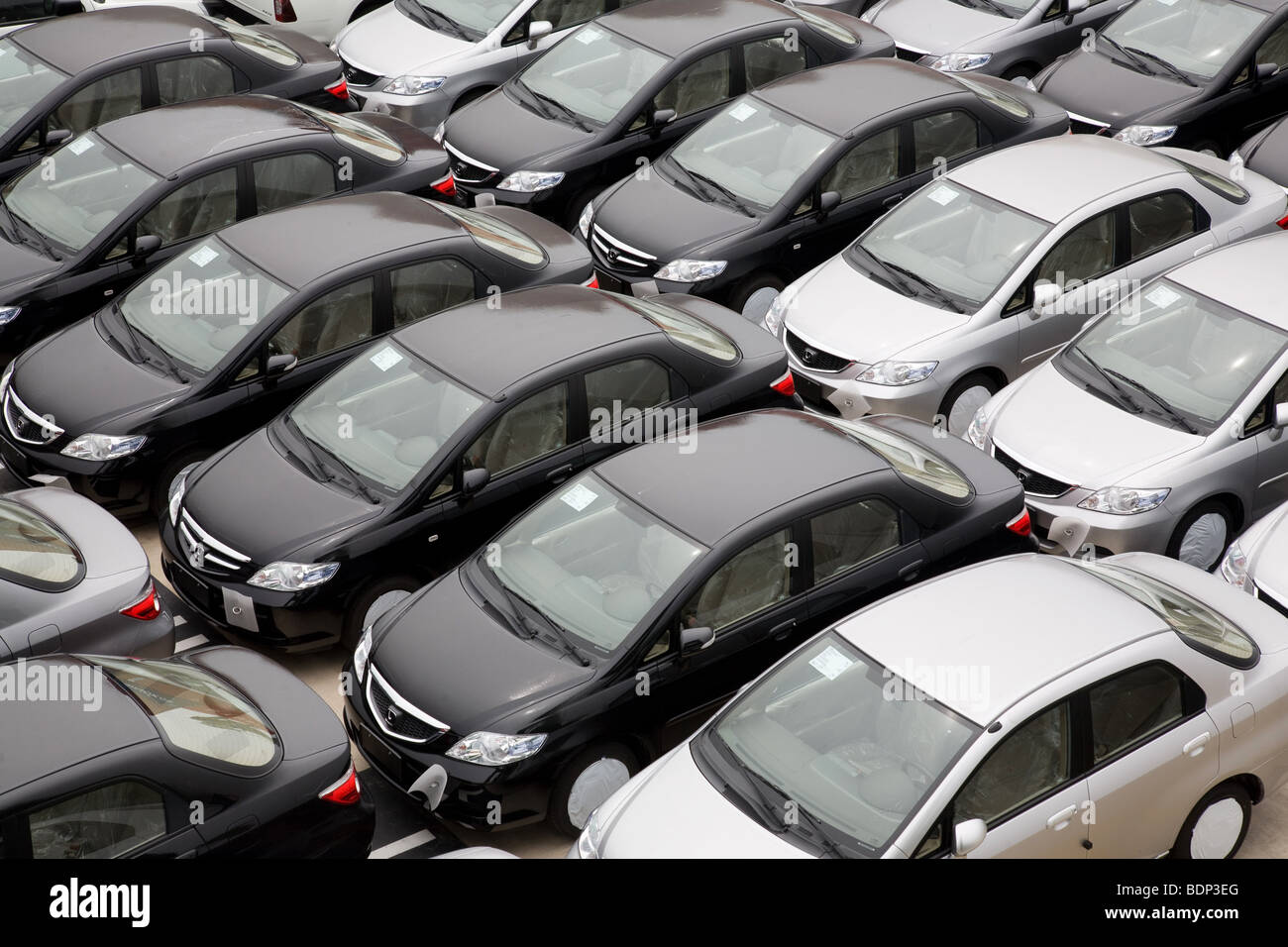 Car import export parked cars shipping pattern Stock Photo - Alamy