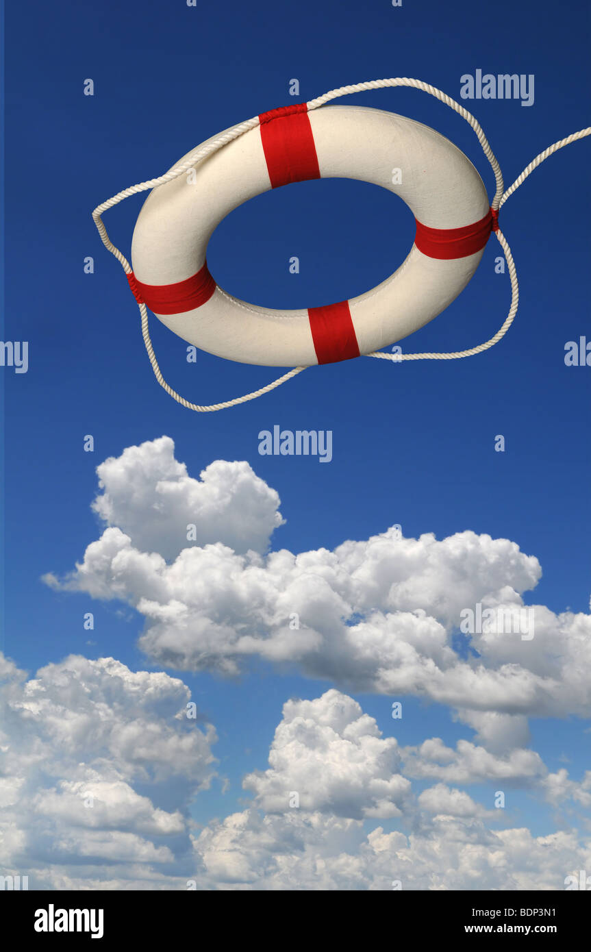 Life preserver over a blue sky with bright clouds Stock Photo - Alamy