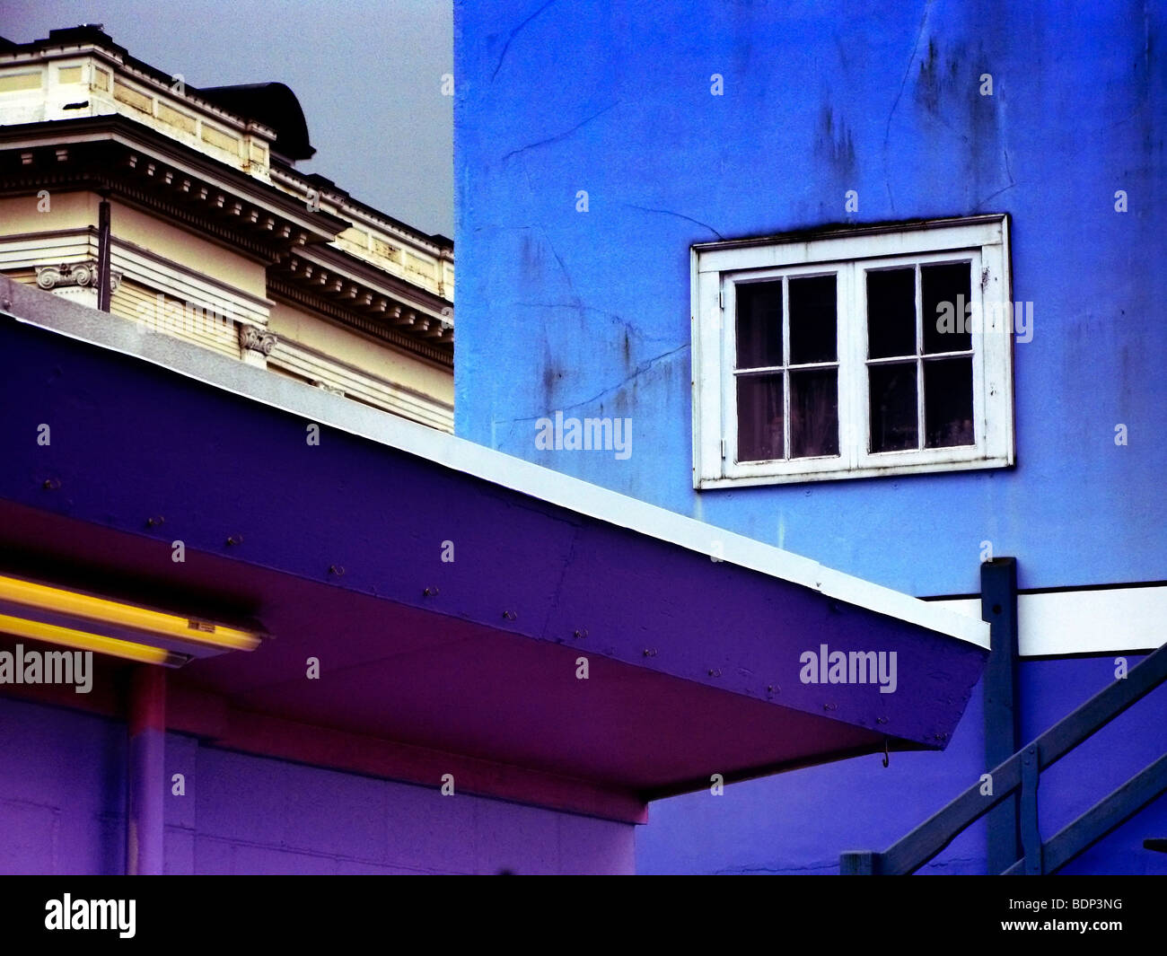 Buildings painted blue and purple Stock Photo - Alamy