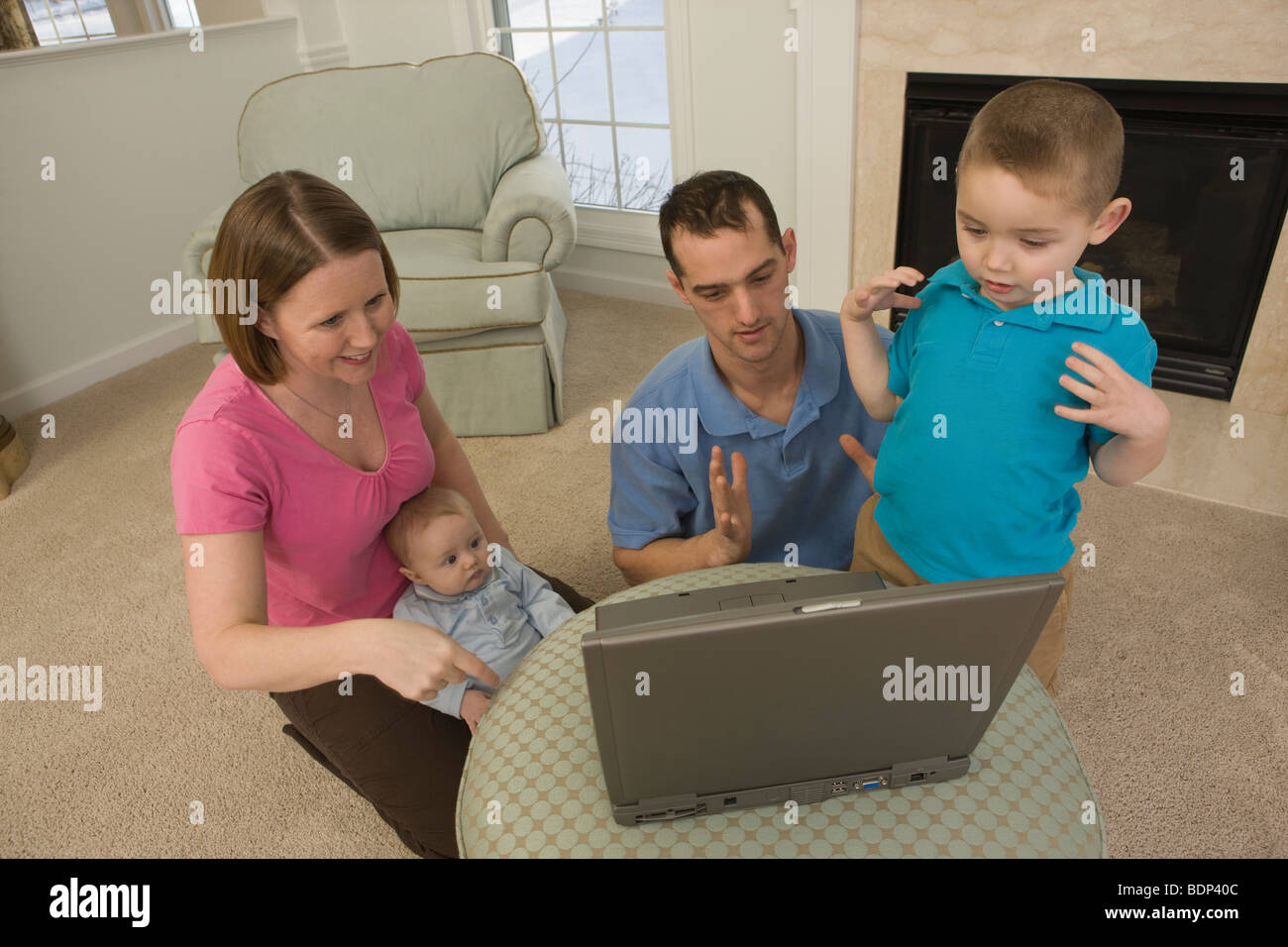 Boy signing the word 'Vacation' in American Sign Language while sitting ...