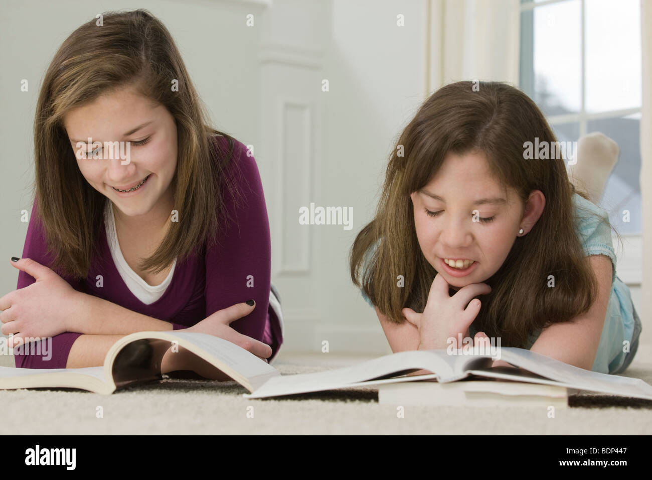 Two teenage girls studying together Stock Photo - Alamy